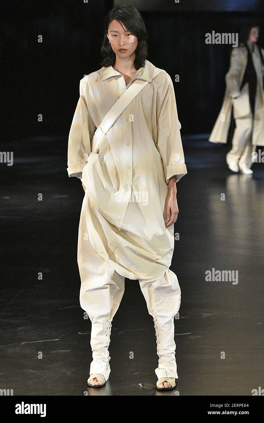 Chu Wong walks on the runway during the Lemaire Fashion Show during ...