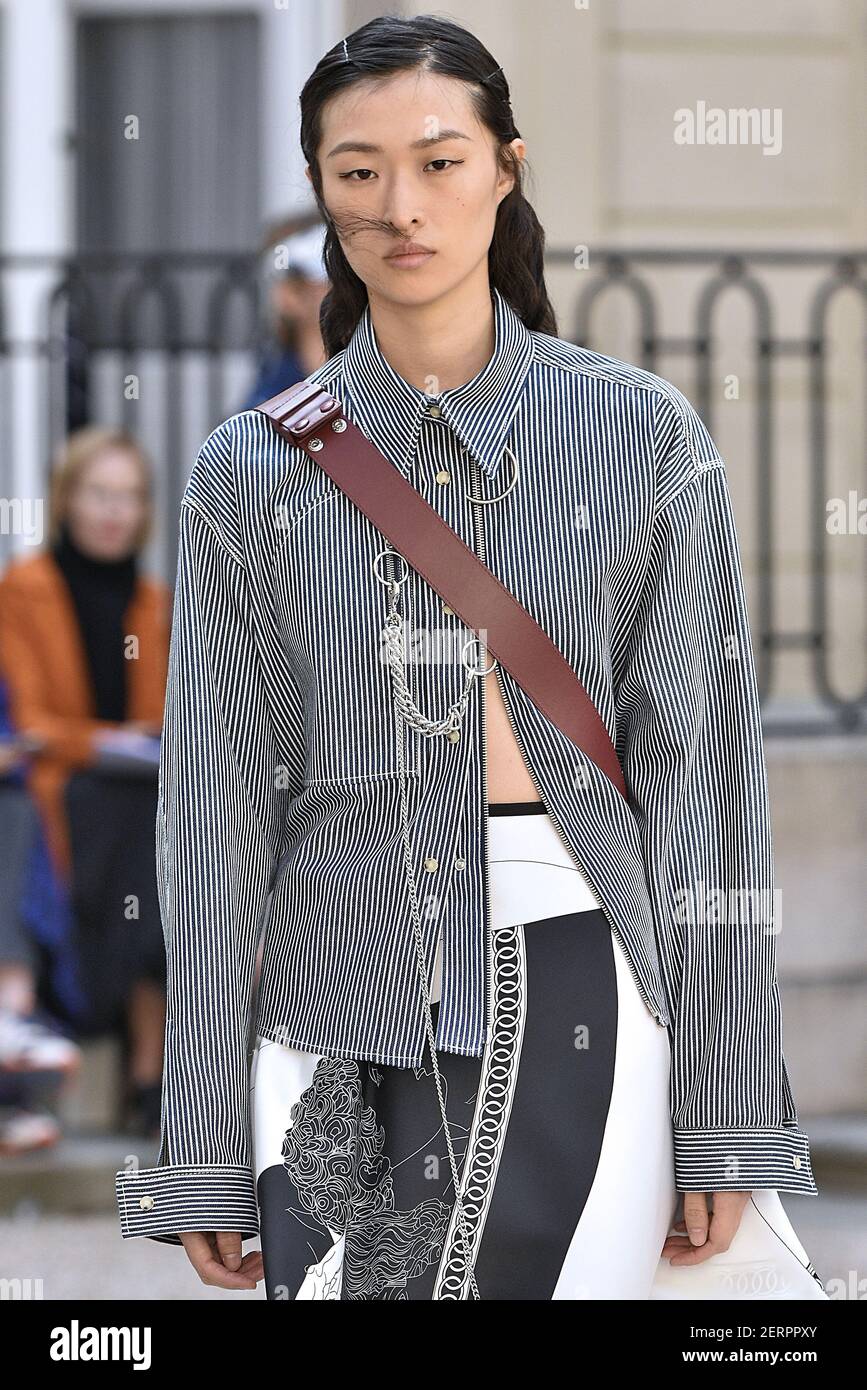 Chu Wong walks on the runway during the Cedric Charlier Fashion Show ...