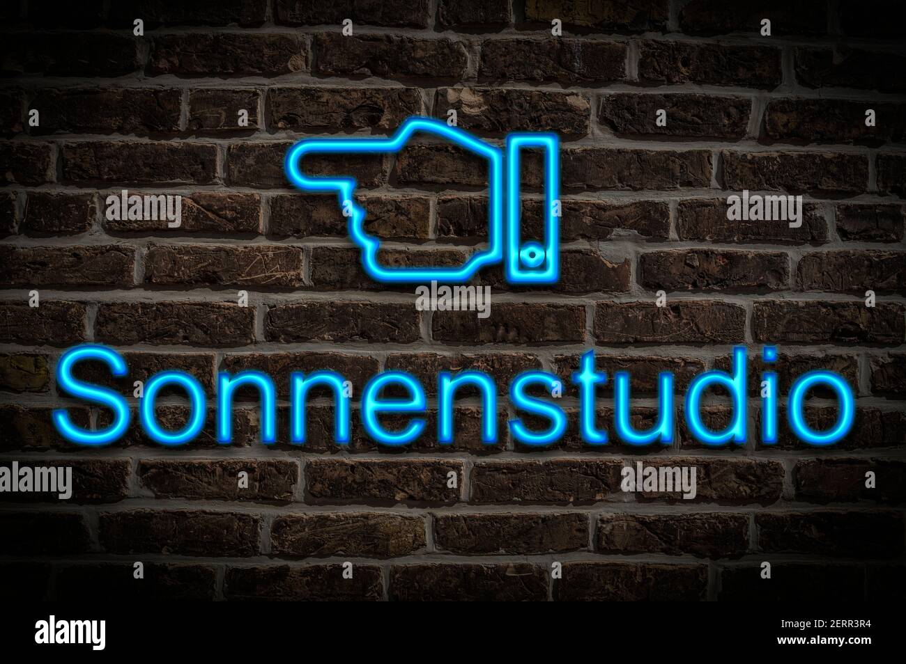 Detail photo of a neon sign on a wall with the inscription Sonnenstudio ...