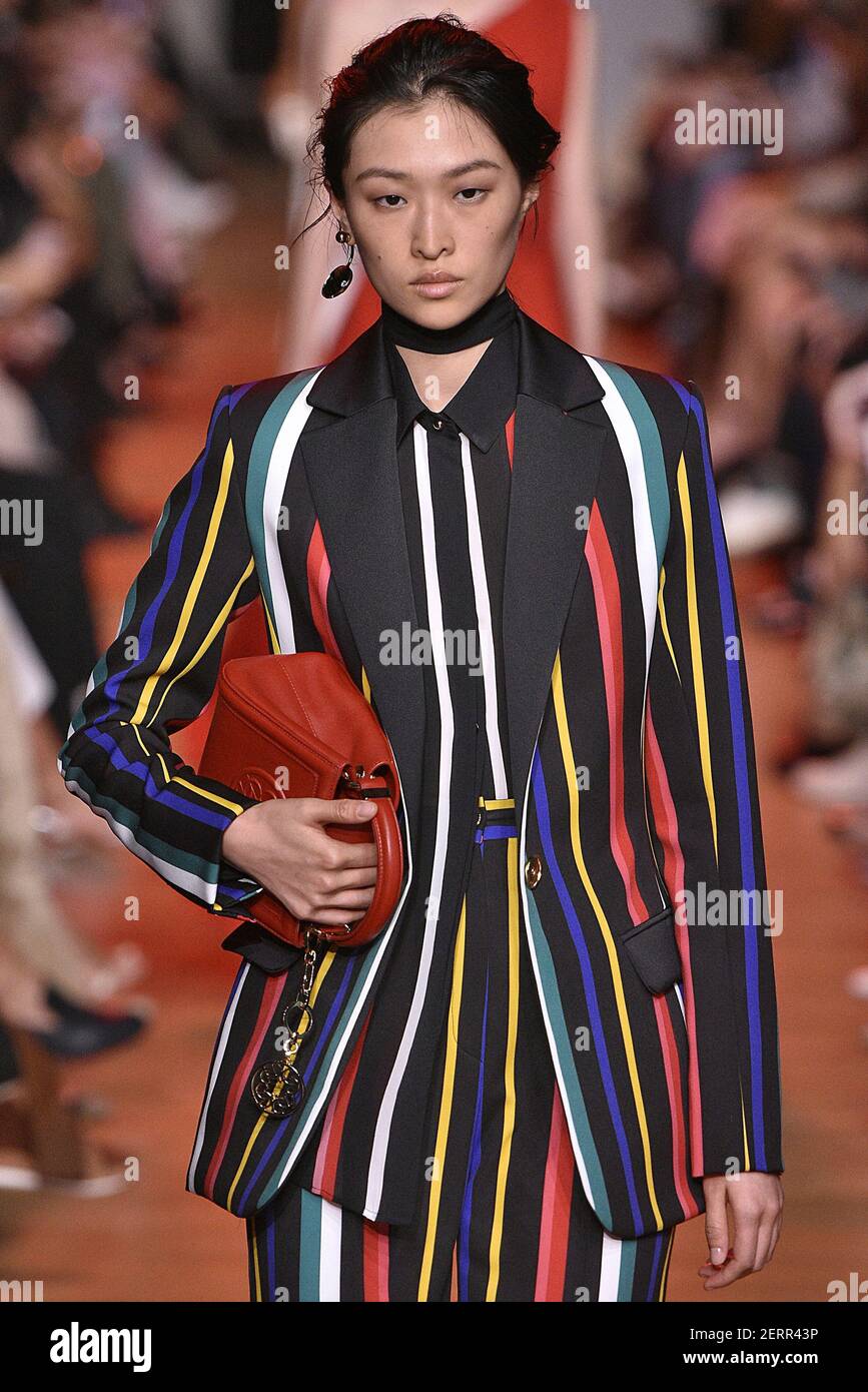 Looks Like Chu Wong walks on the runway during the Elie Saab Fashion ...