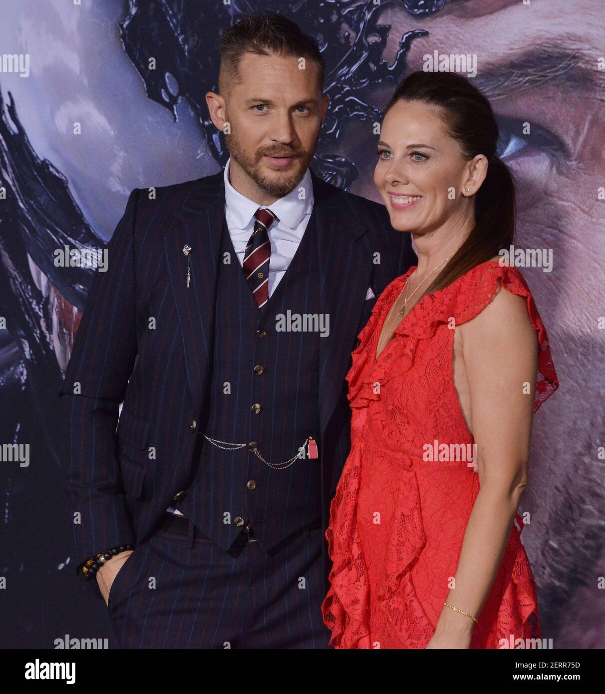 (L-R) Tom Hardy and Kelly Marcel at the “Venom” Los Angeles Premiere ...