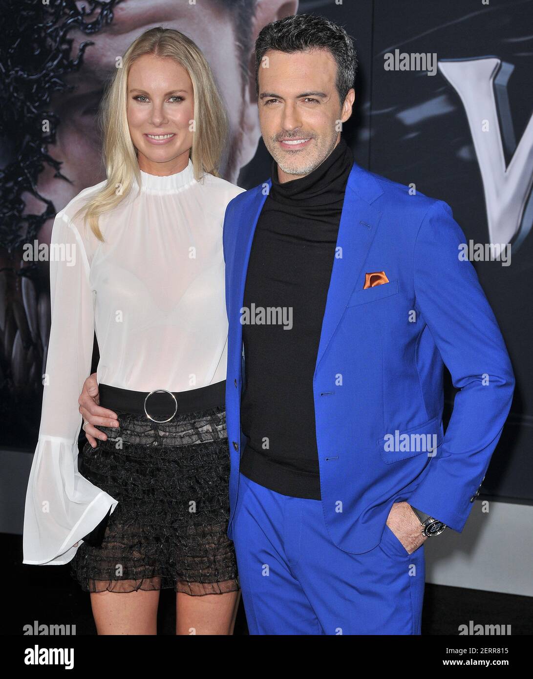 Elspeth Keller and Reid Scott at the “Venom” Los Angeles Premiere held ...