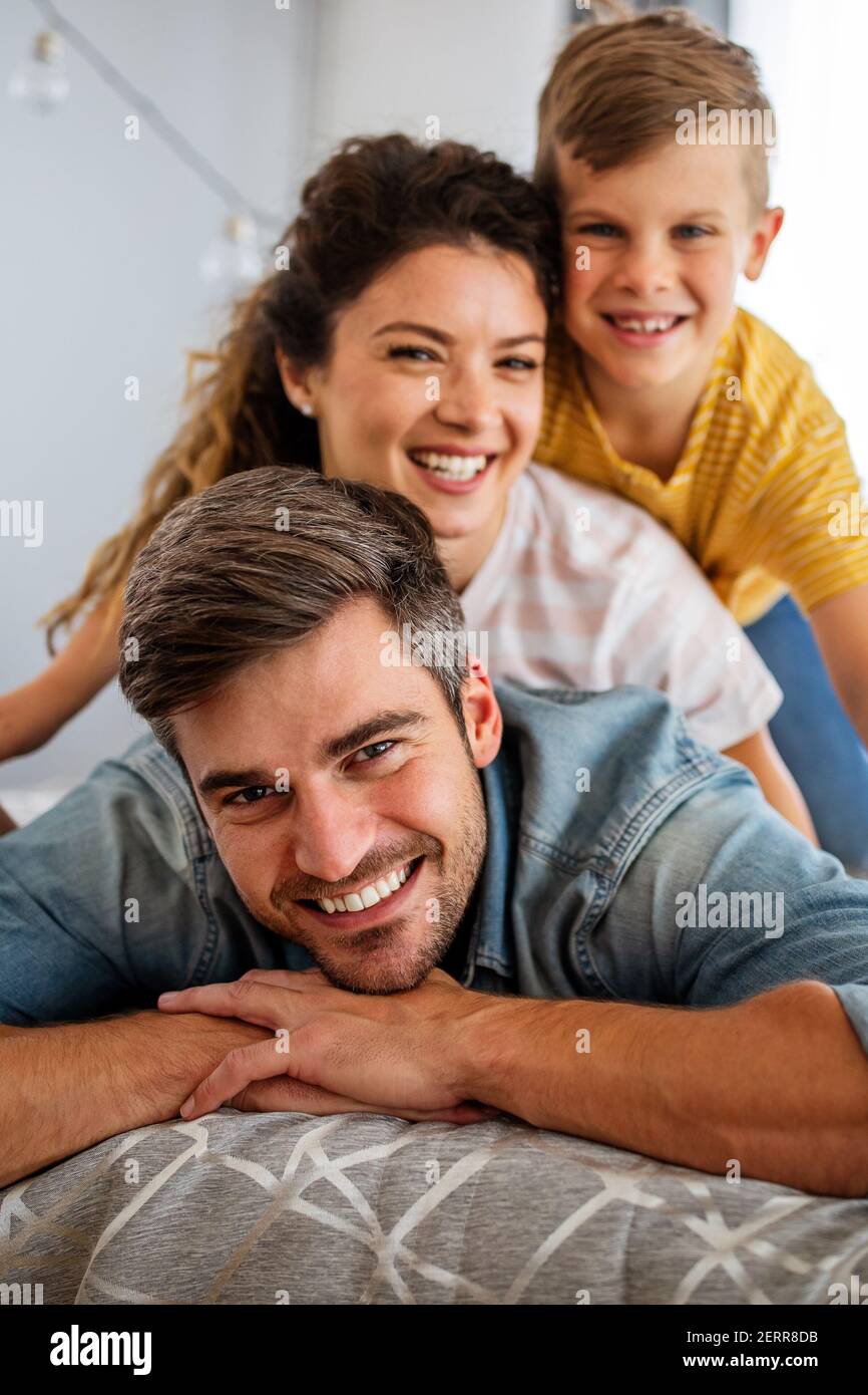 Happy family having fun time at home Stock Photo - Alamy