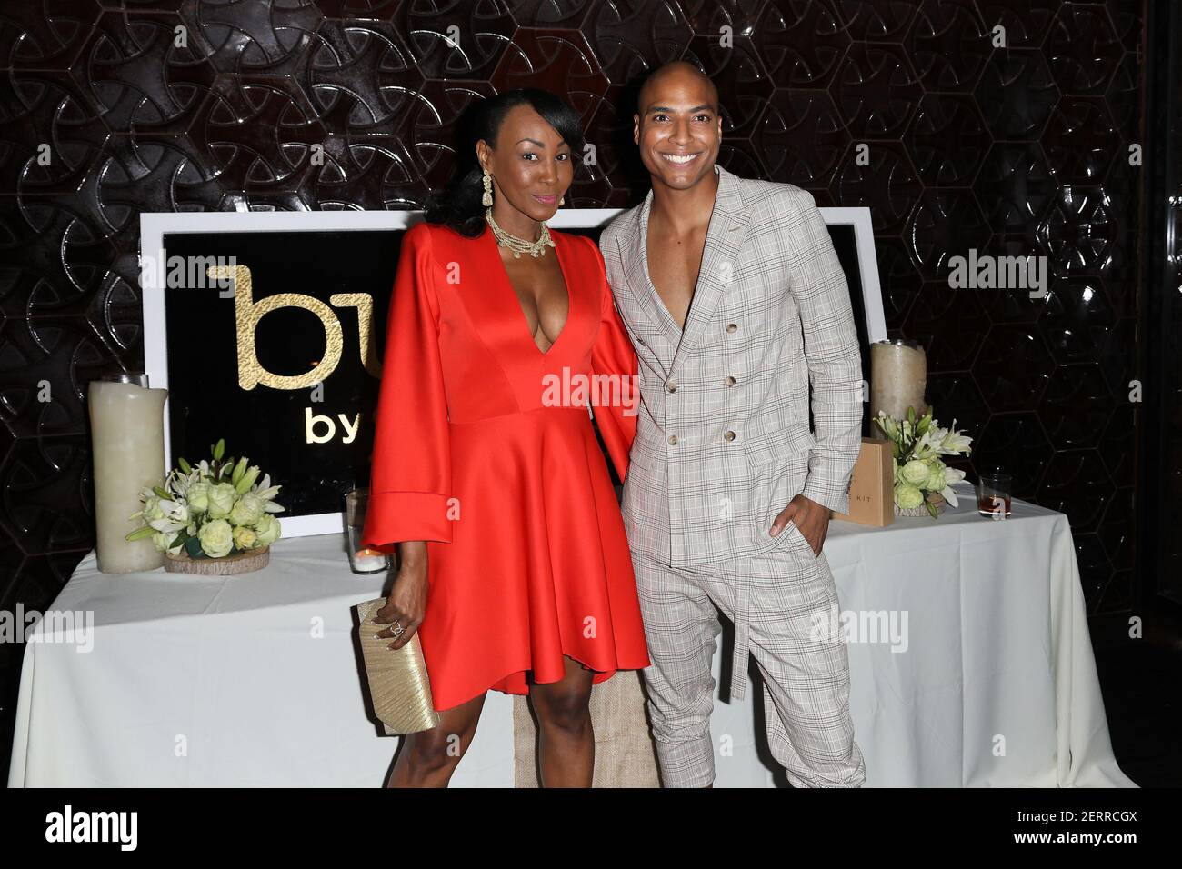 Carrie Bernans and Dorion Renaud at the Buttah Skincare Launch Hosted ...