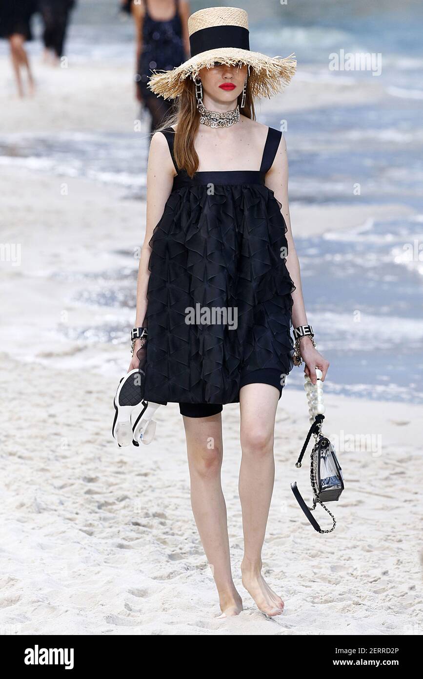 Model Lex Herl walks on the runway during the Chanel Fashion Show ...