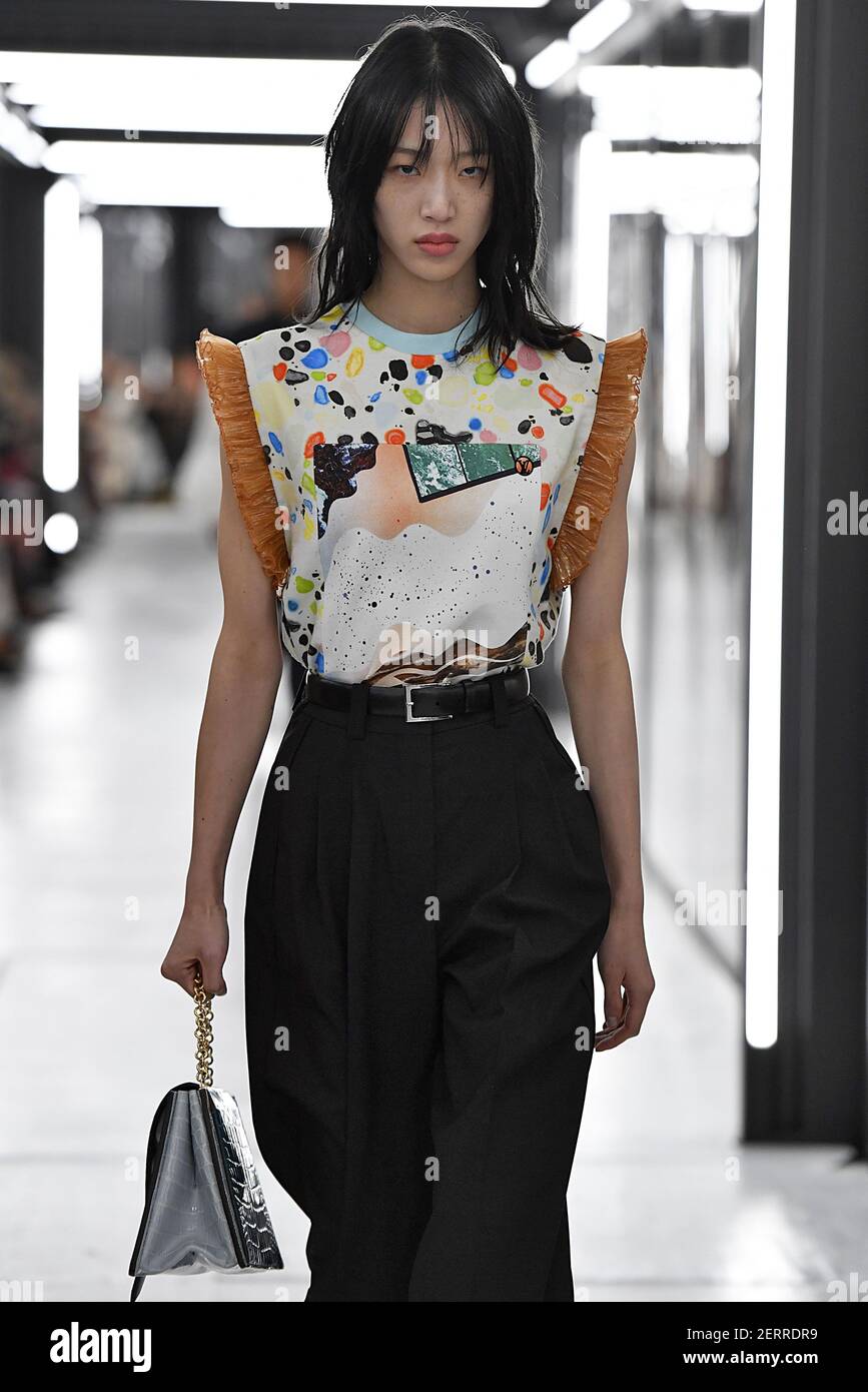 Sora Choi walks on the runway during the Louis Vuitton Fashion Show ...