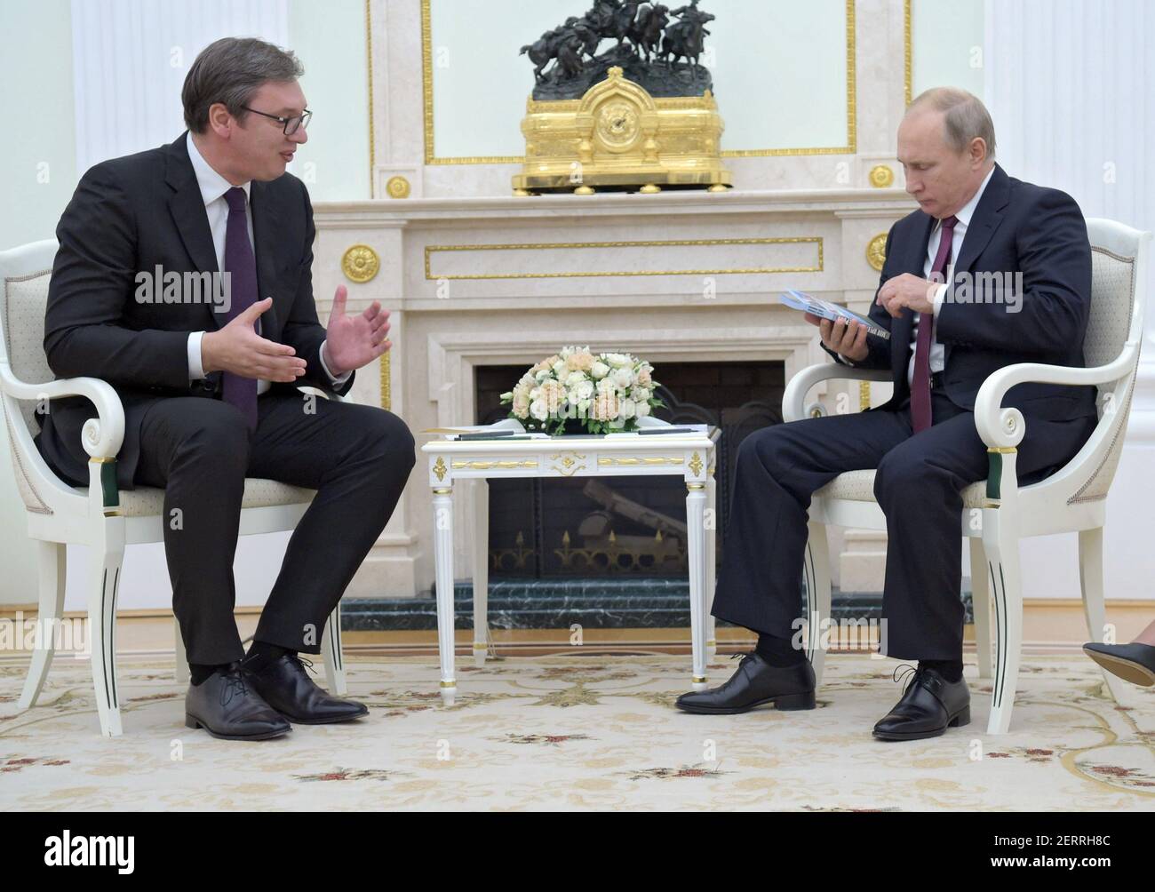 Russian President Vladimir Putin (right) during the meeting with ...