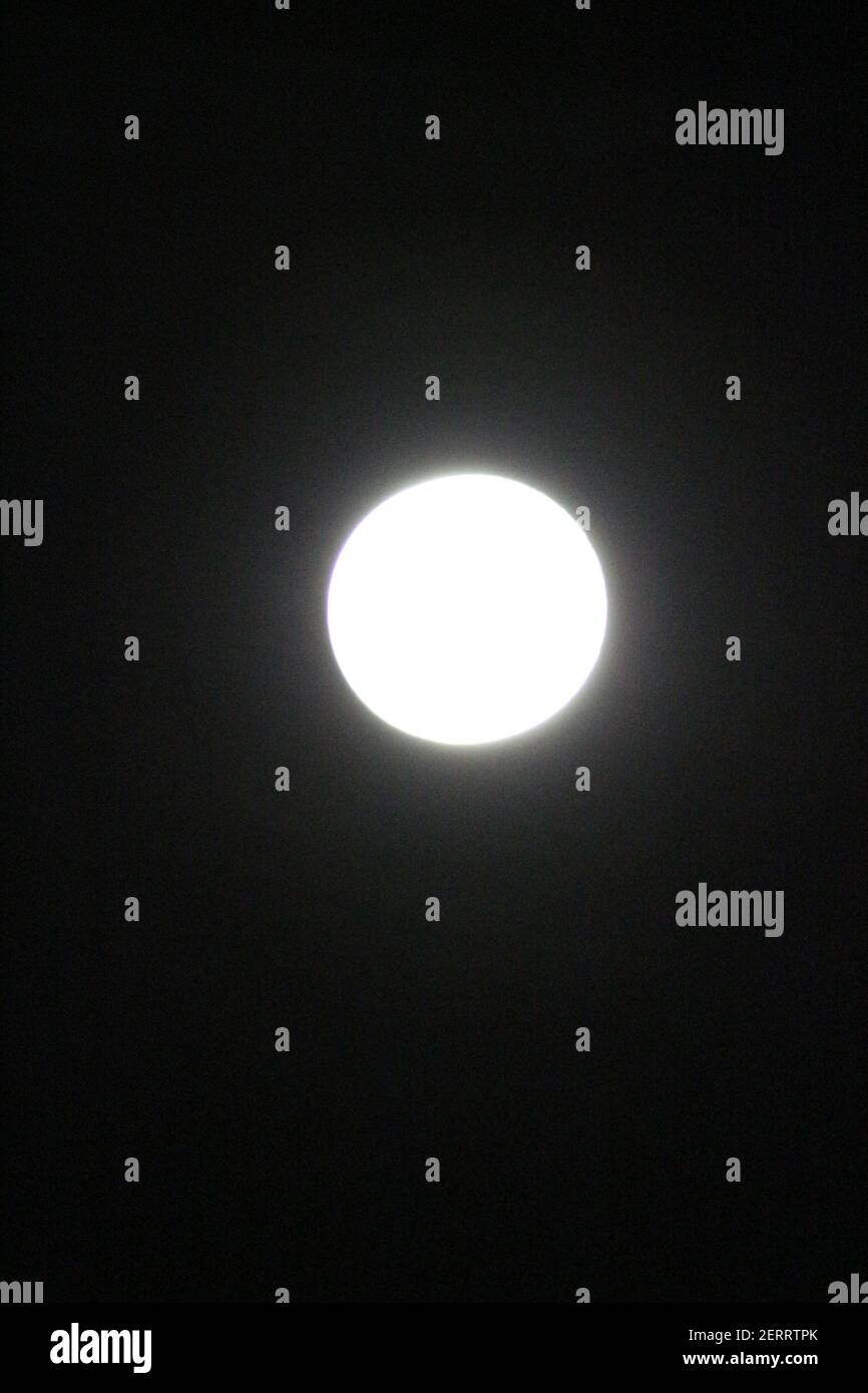 full moon in a dark night Stock Photo - Alamy