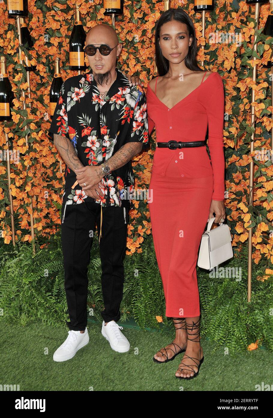 (L-R) Tylynn Nguyen and Bee at the 9th Annual Veuve Clicquot Polo ...