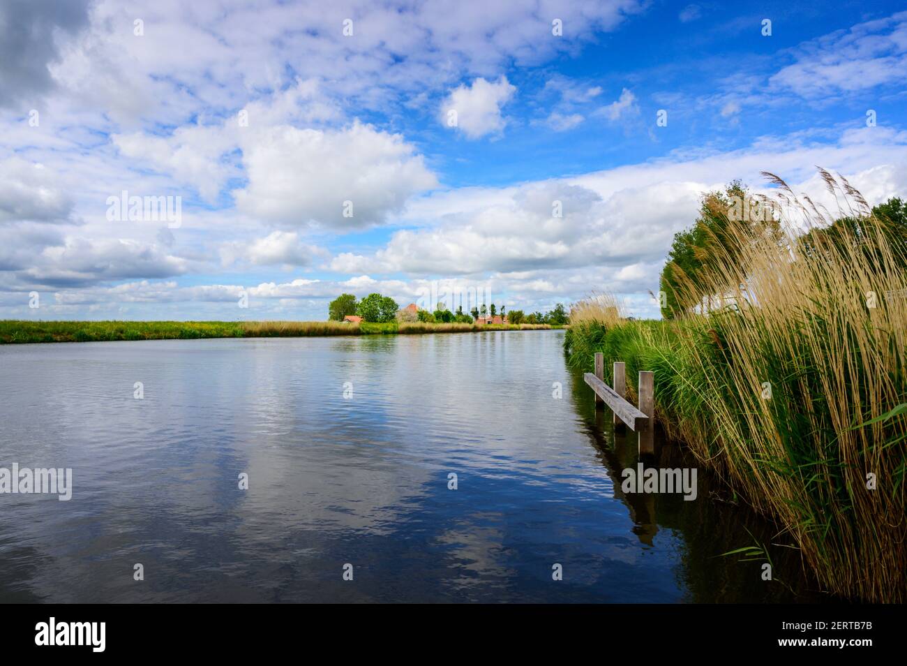 River in Dutch landscape with cloud reflection, North Holland, the ...