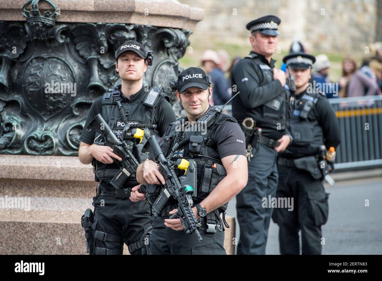 Police during the carriage procession after their royal wedding ...