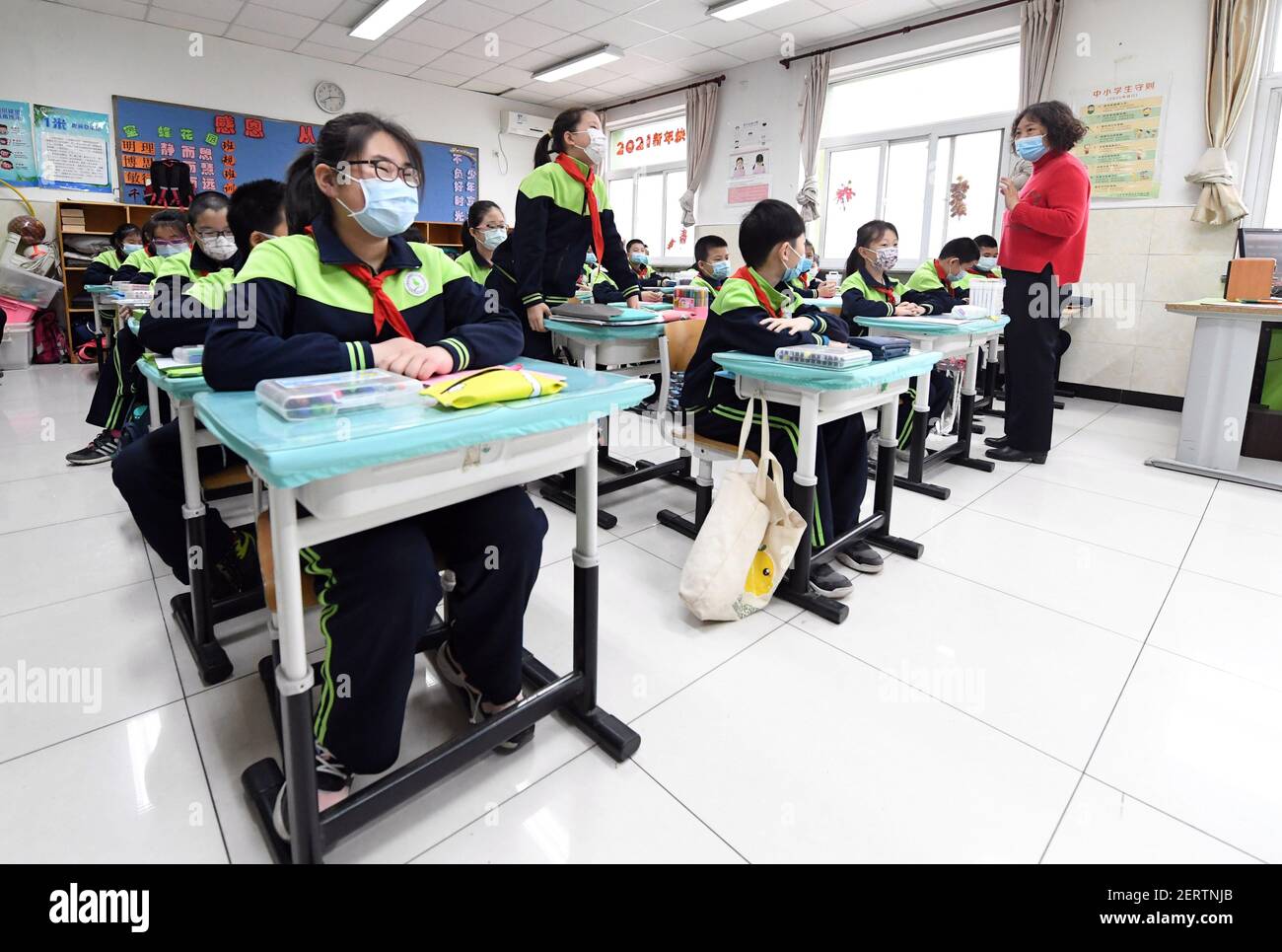Beijing, China. 1st Mar, 2021. Students have class at Beijing Taipinglu ...