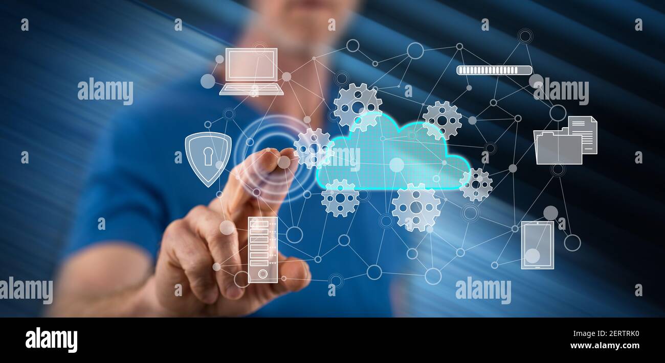 Man touching a cloud computing concept on a touch screen with his ...