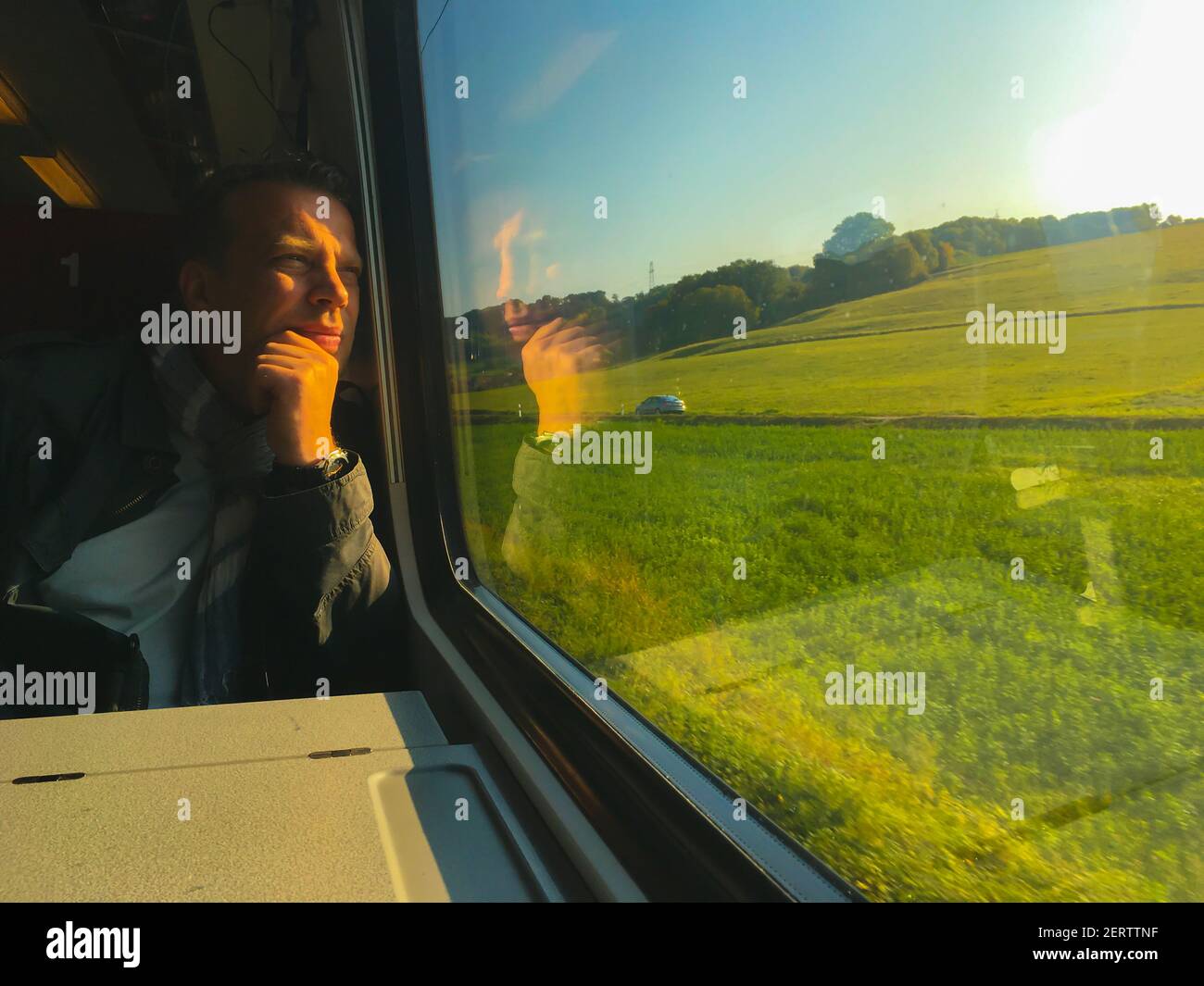 Hand in train window hi-res stock photography and images - Alamy