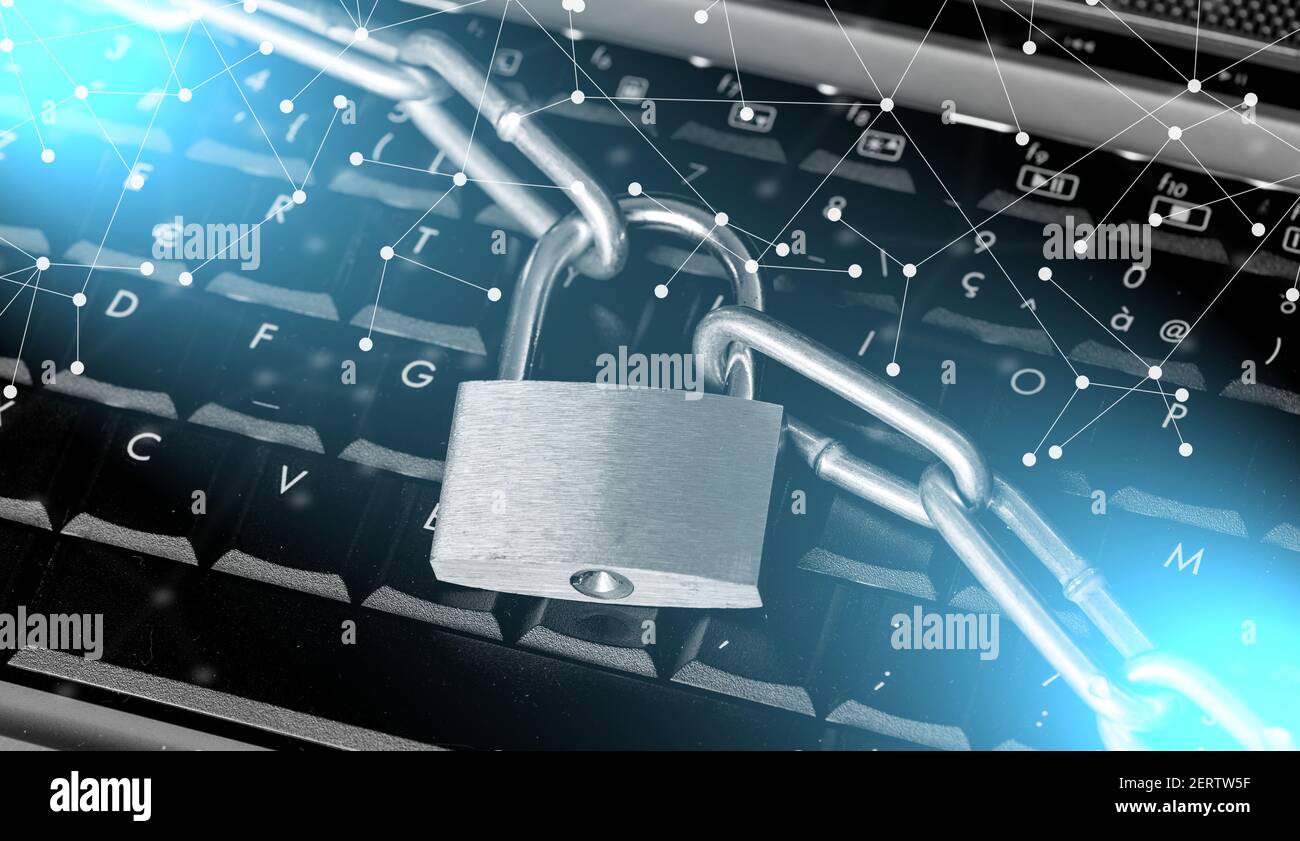 Computer security concept with a padlock and a chain on a keyboard ...