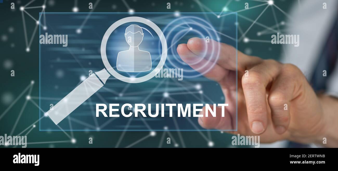 Man touching a recruitment concept on a touch screen with his finger ...