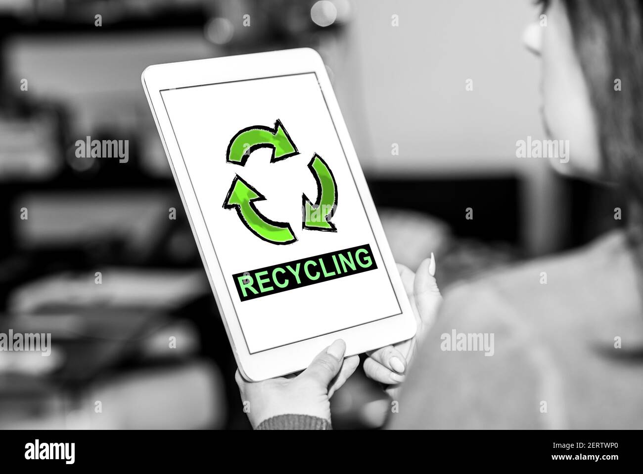 Tablet screen displaying a recycling concept Stock Photo - Alamy
