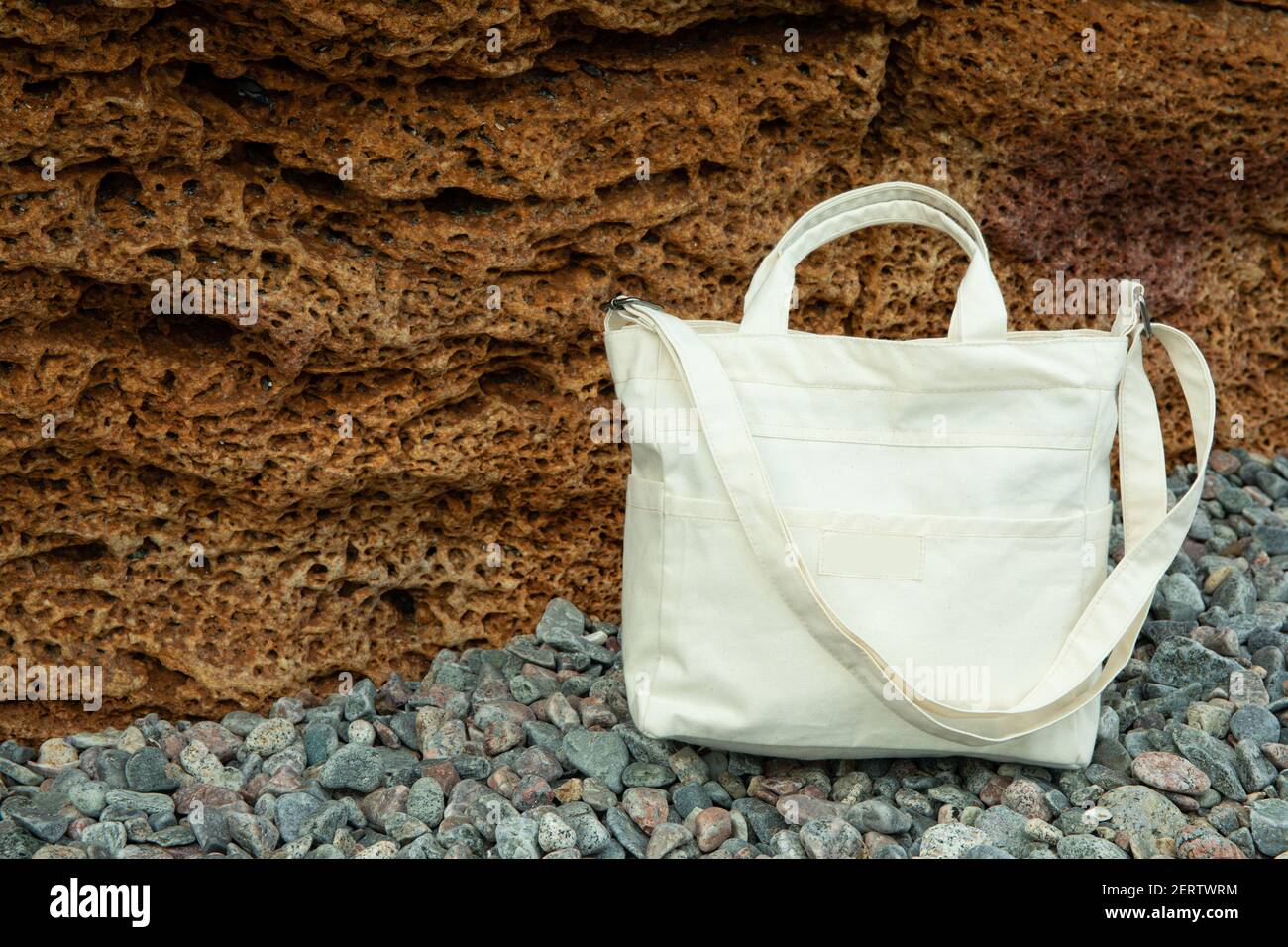 Stylish blank eco bag on sea stones outdoor Stock Photo - Alamy