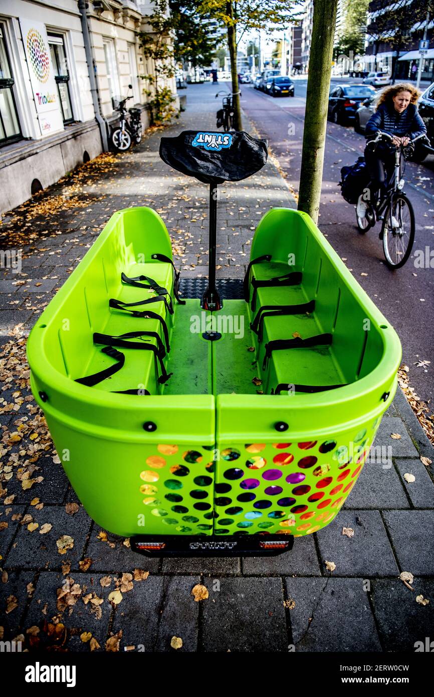 THE HAGUE- A Stint cargo vehicle is parked on a street in The Hague on ...