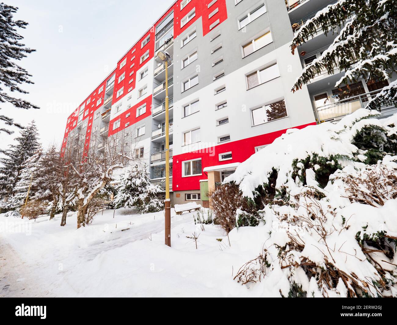 Prefabricated building in winter time. Typical town suburban ...