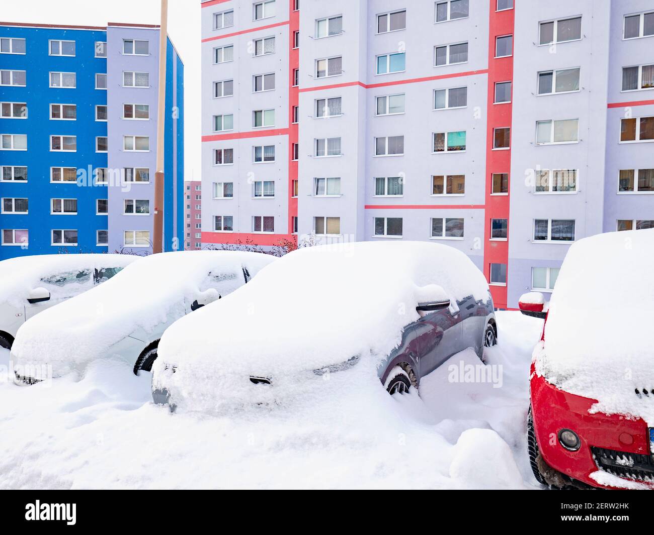 Street blocked by cover of fresh snow since night big snowstorm. Cars ...