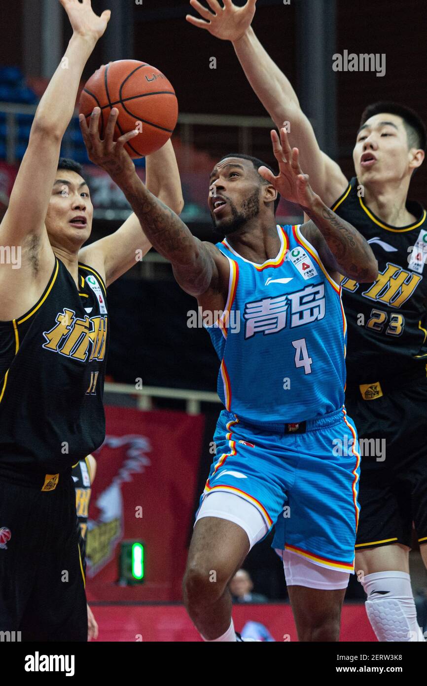 Zhuji, China's Zhejiang Province. 1st Mar, 2021. Darius Adams (C) of ...