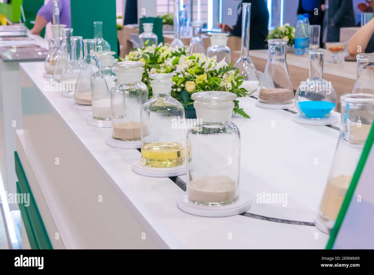 Glass bottles with different chemical reagents samples Stock Photo - Alamy