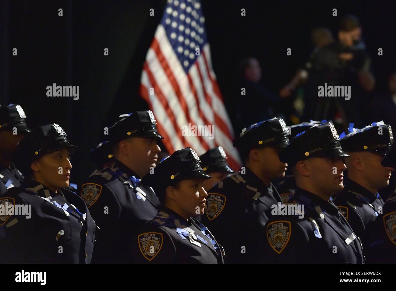 With confetti on their uniforms, new members of the New York City ...