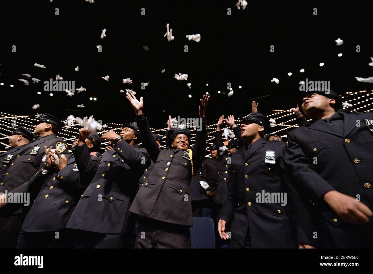 New members of the New York City Police Department (NYPD) celebrate at ...