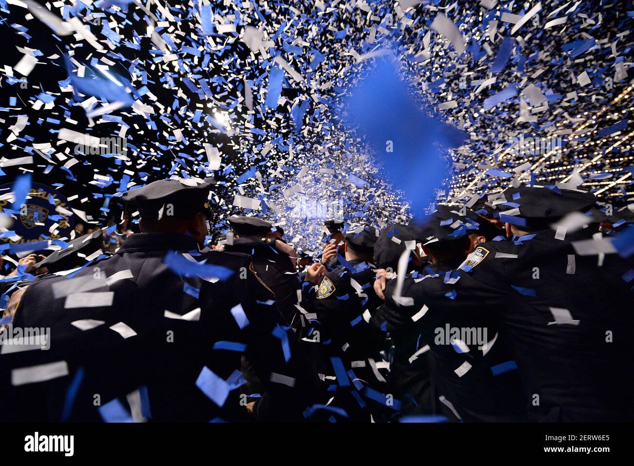 New members of the New York City Police Department (NYPD) celebrate at ...