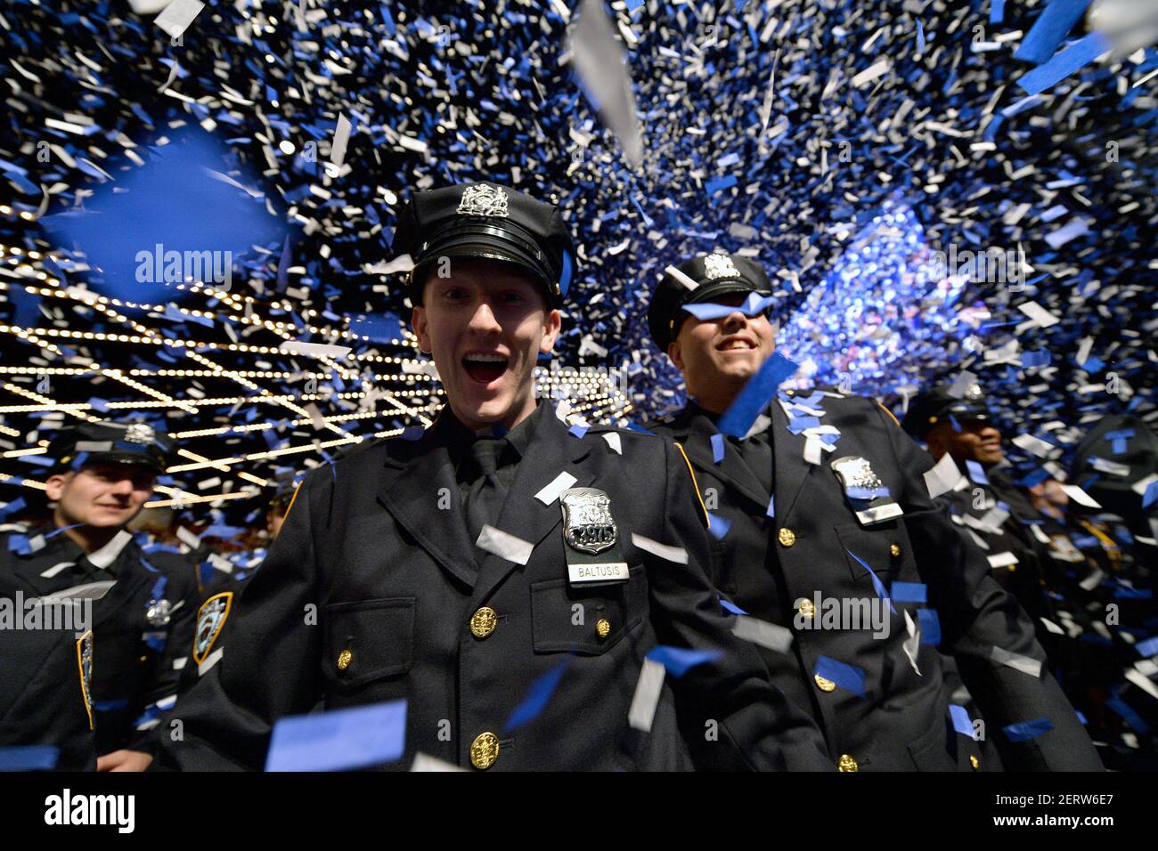 New members of the New York City Police Department (NYPD) celebrate at ...