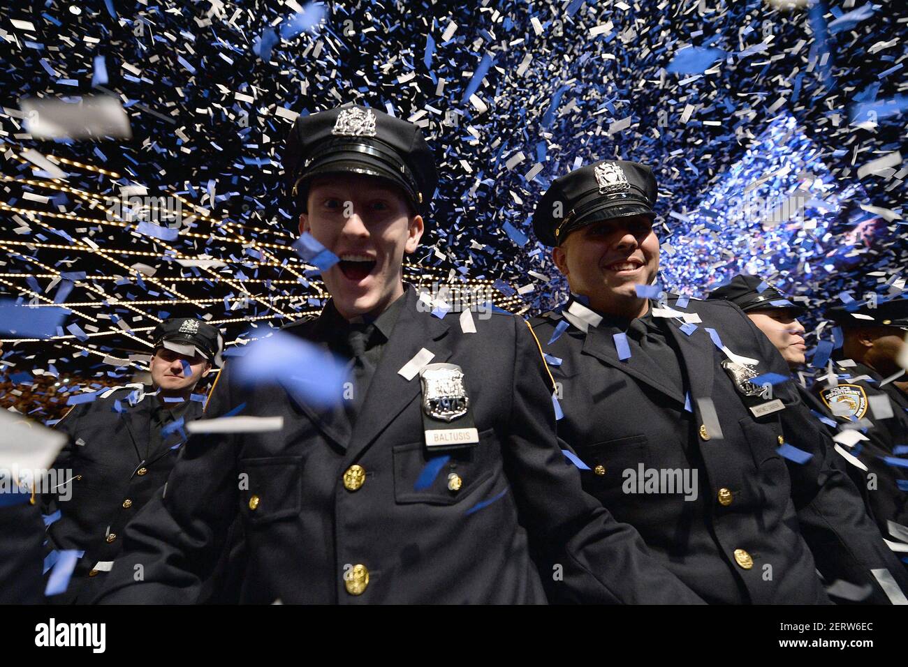 New members of the New York City Police Department (NYPD) celebrate at ...