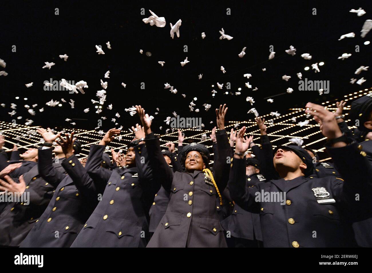 New members of the New York City Police Department (NYPD) celebrate at ...
