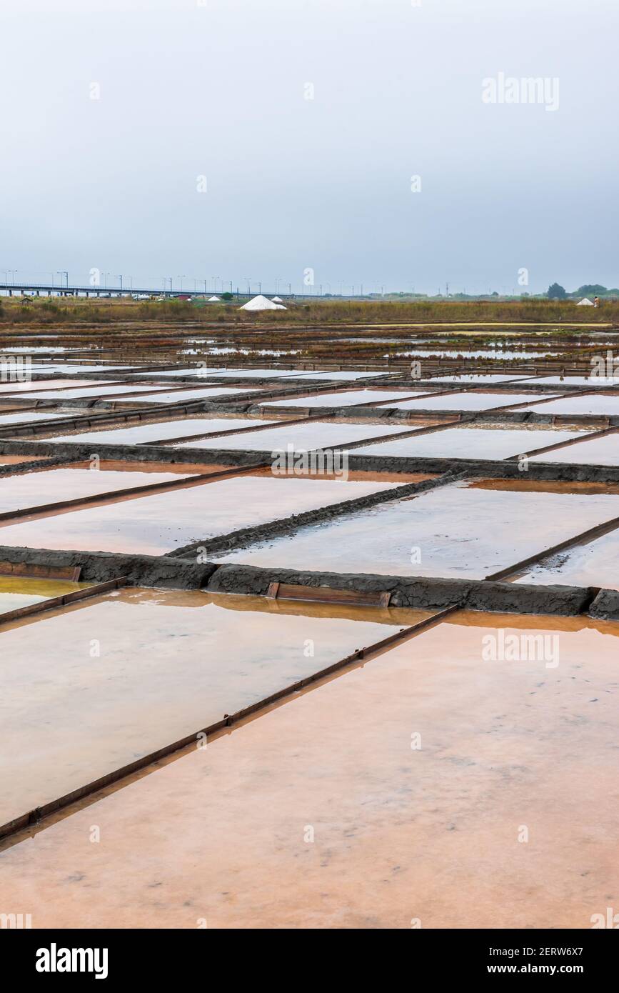 Different types of salt in salt pans with salt harvesting pools Stock ...