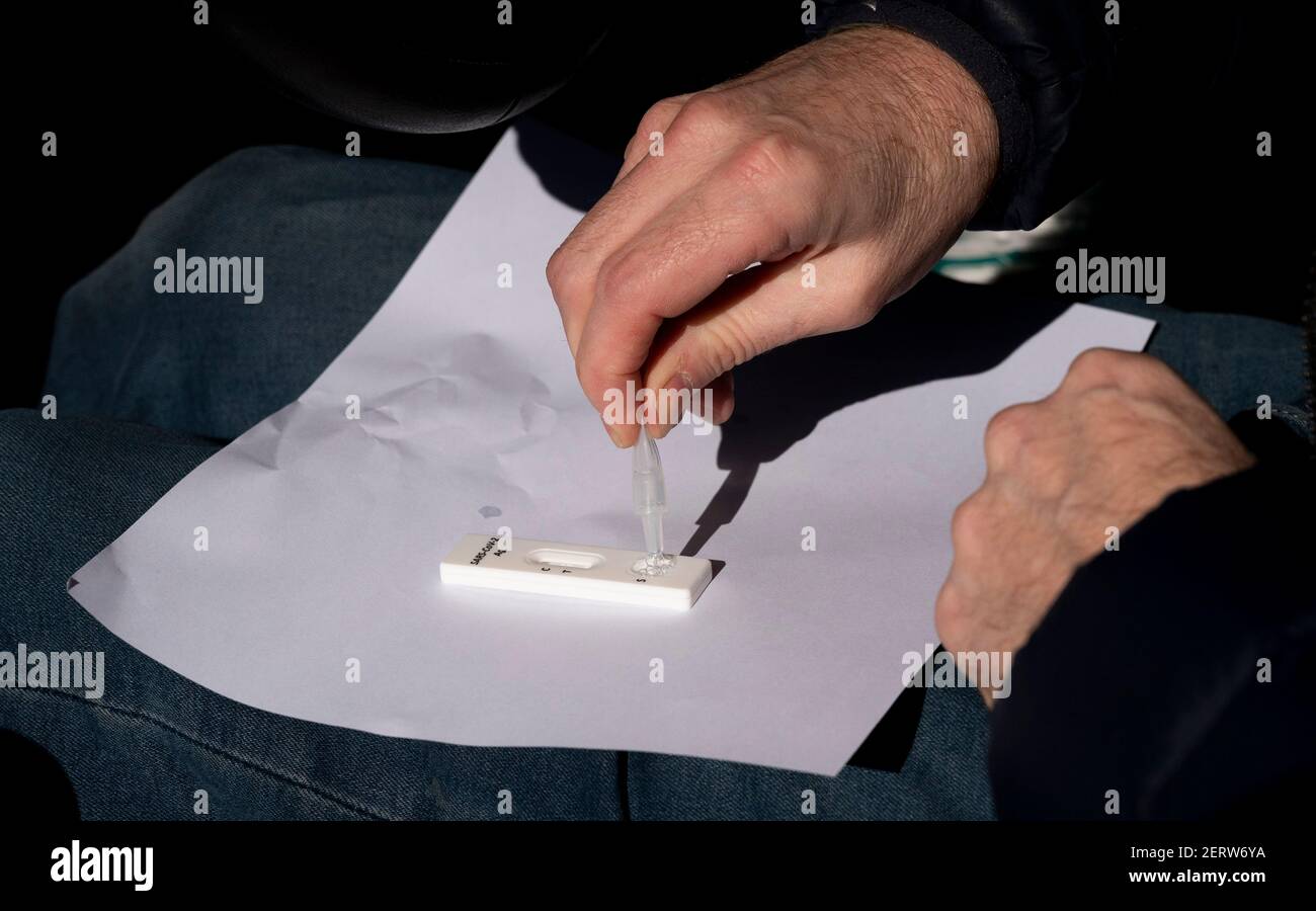 Covid 19 self testing hi-res stock photography and images - Alamy