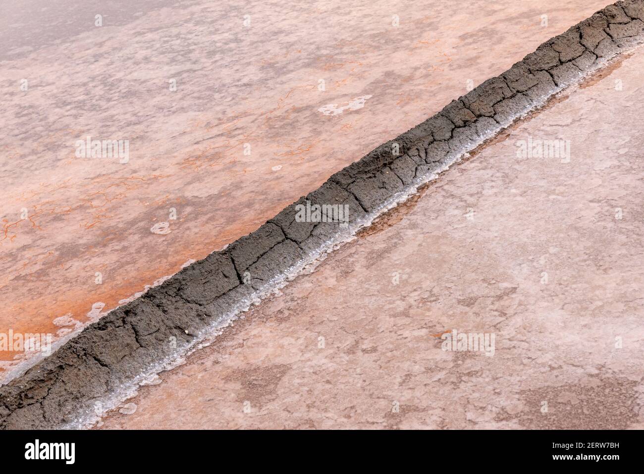 Different types of salt in salt pans with salt harvesting pools Stock ...