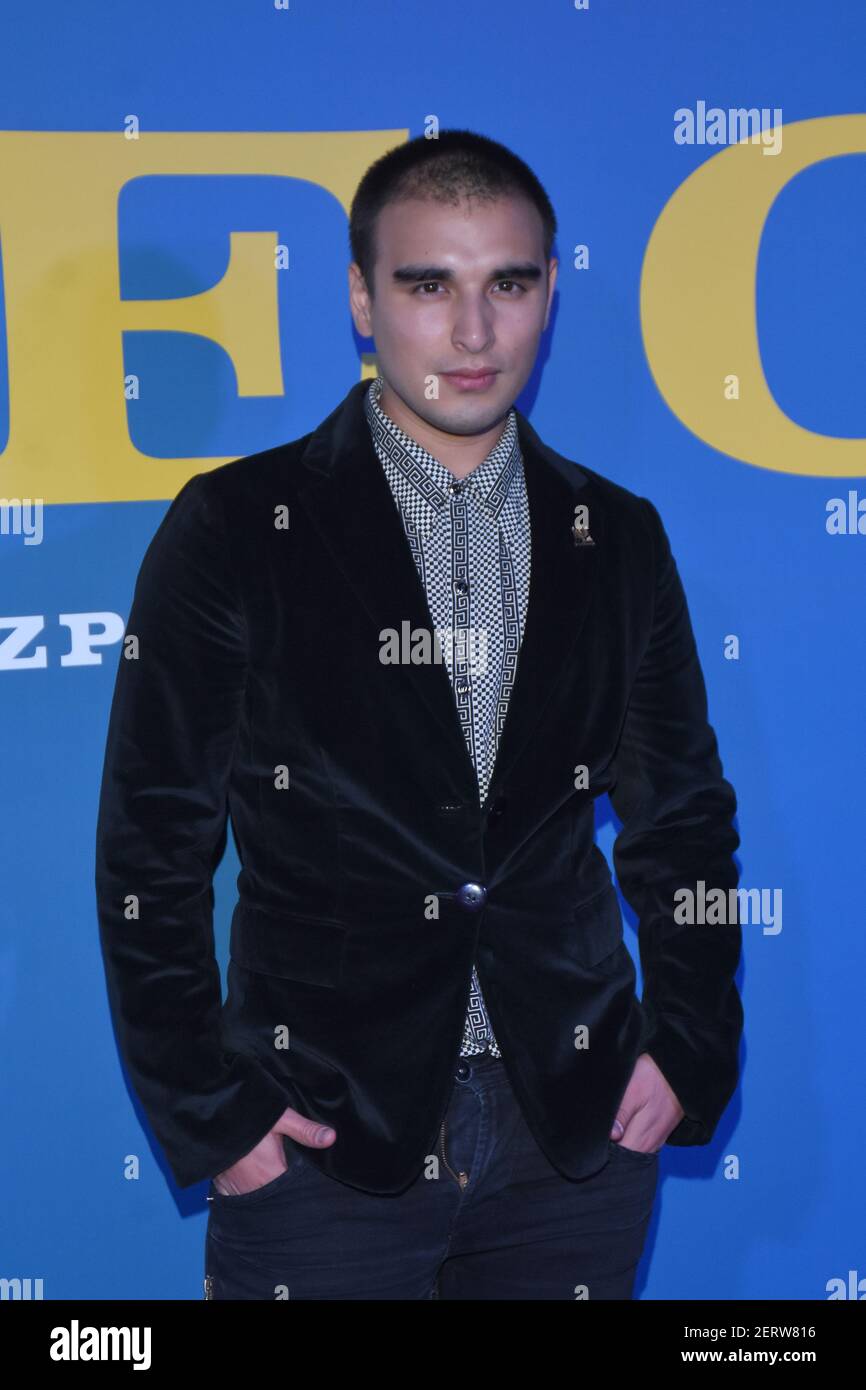 Alfredo Felix poses for photos during the red carpet of film premiere ...