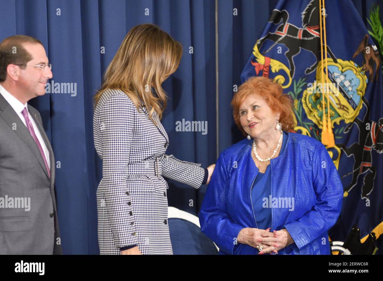 Dr. Loretta Finnegan is honored with an award out of hands of First ...