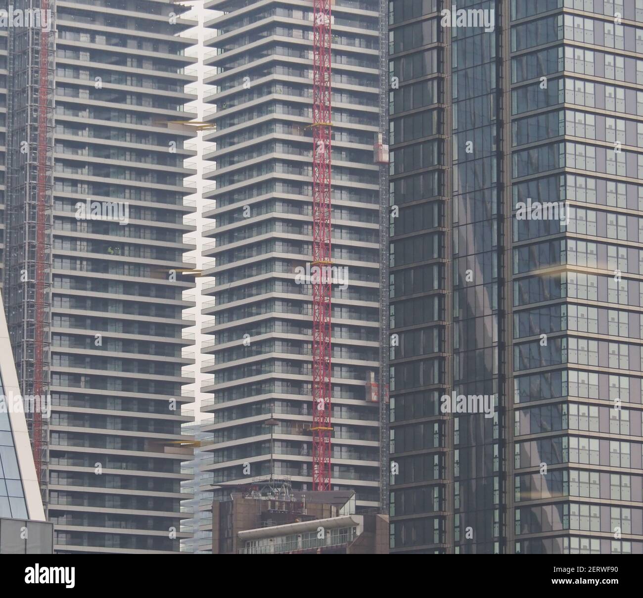 tower crane seen building modern high rise buildings in London Stock ...