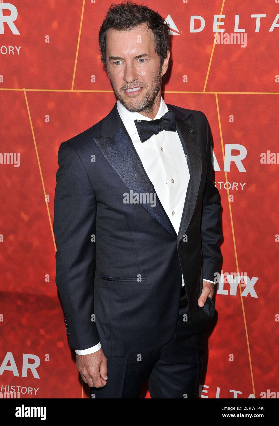 Blake Mycoskie arrives at the amfAR Gala Los Angeles 2018 held at the ...