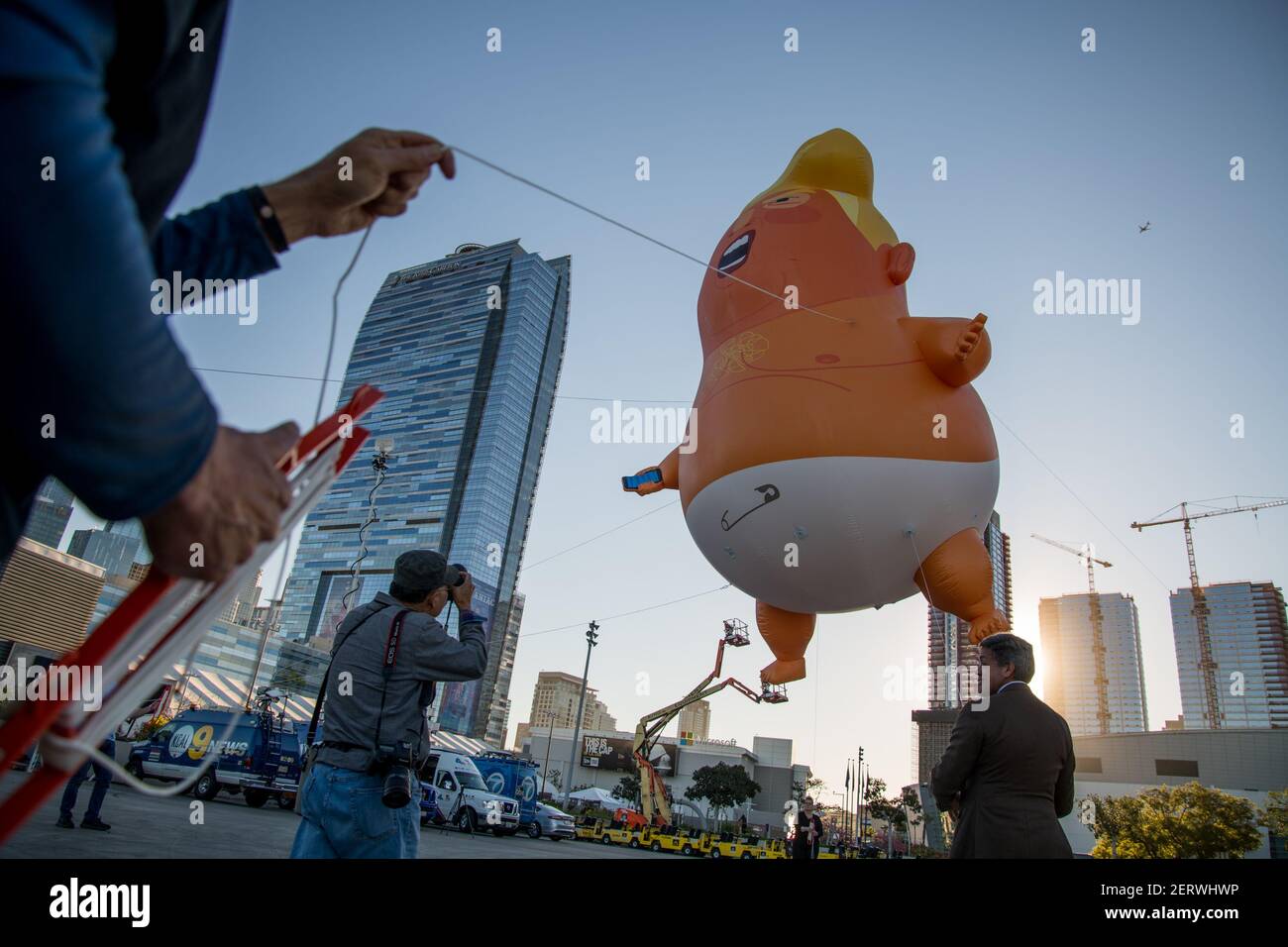 A large balloon depicting Donald Trump as a baby in a diaper is flown ...