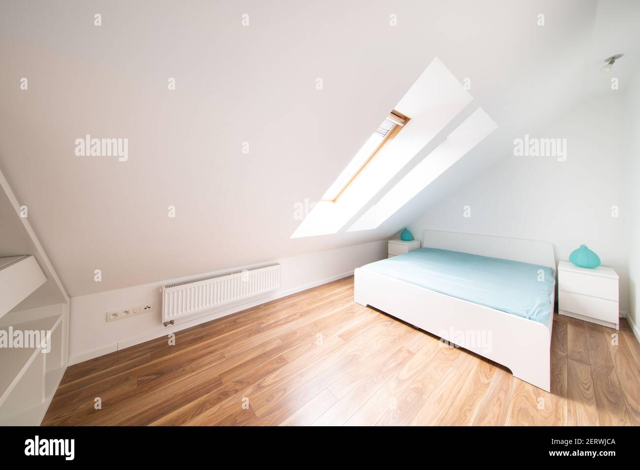 attic bedroom with roof window Stock Photo - Alamy