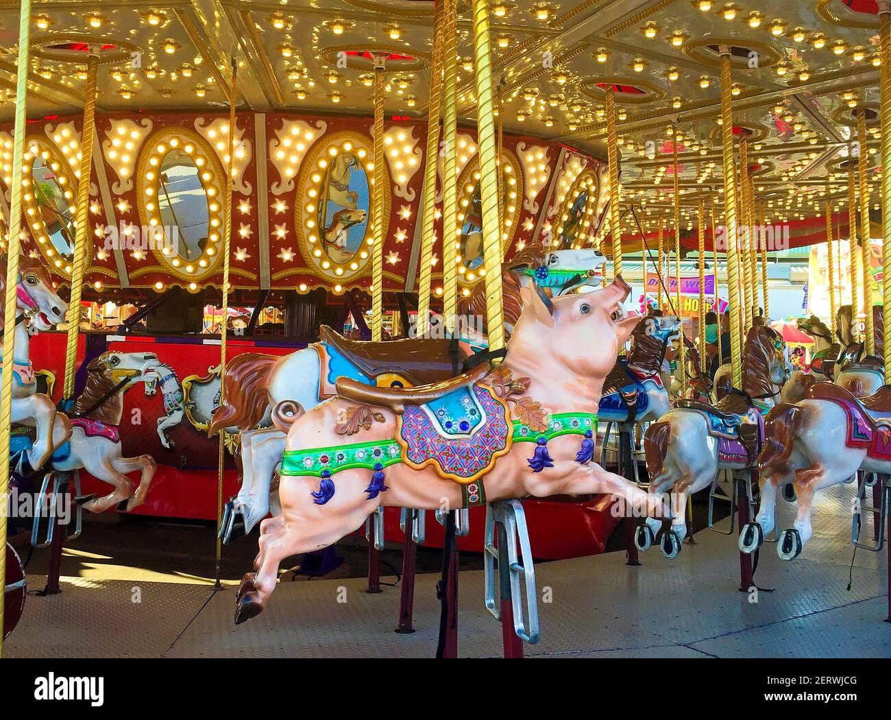 An empty animal ride carousel Stock Photo - Alamy