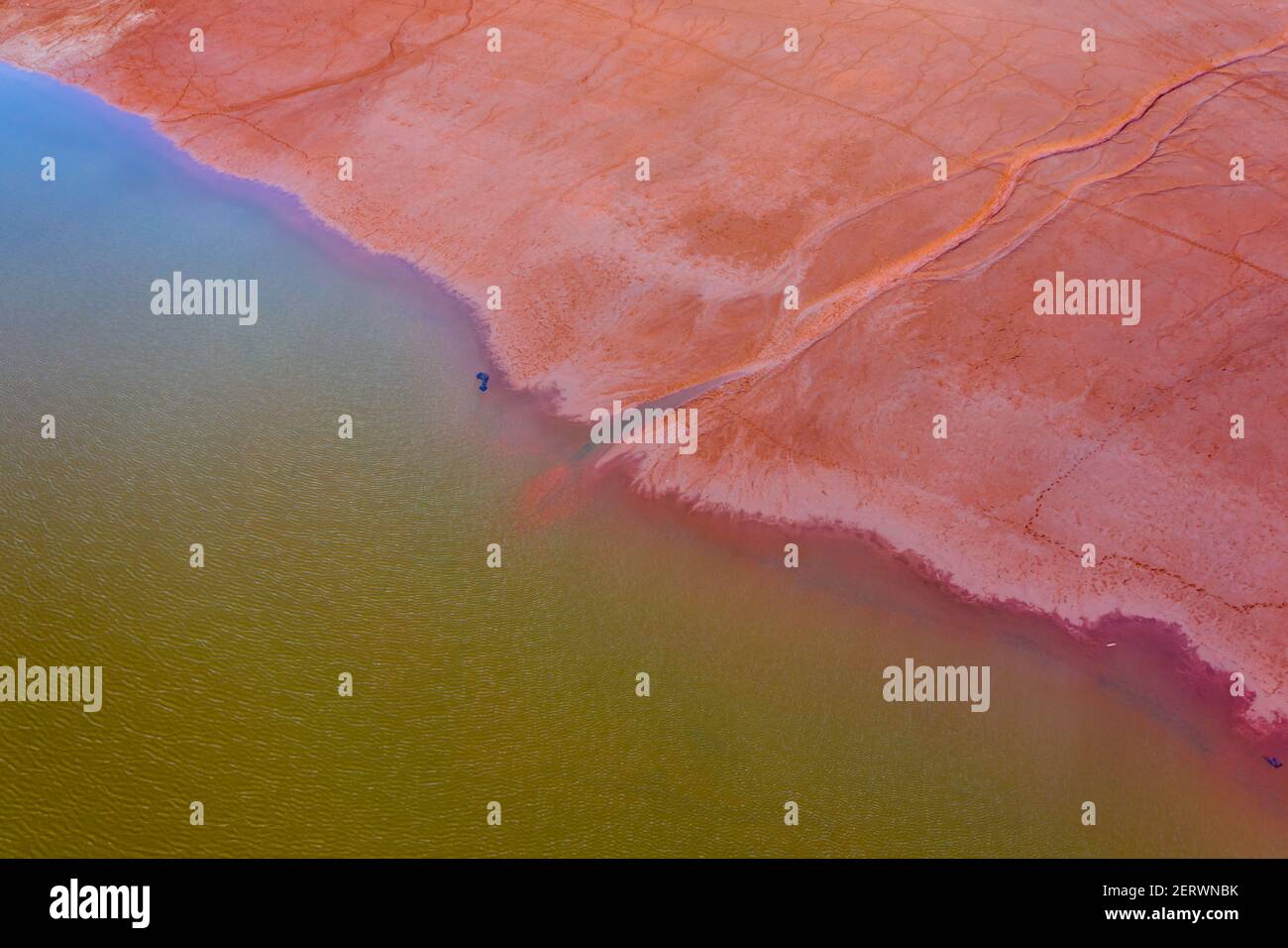 Aerial view of a reservoir full of red toxic sludge. Hungary - red mud ...