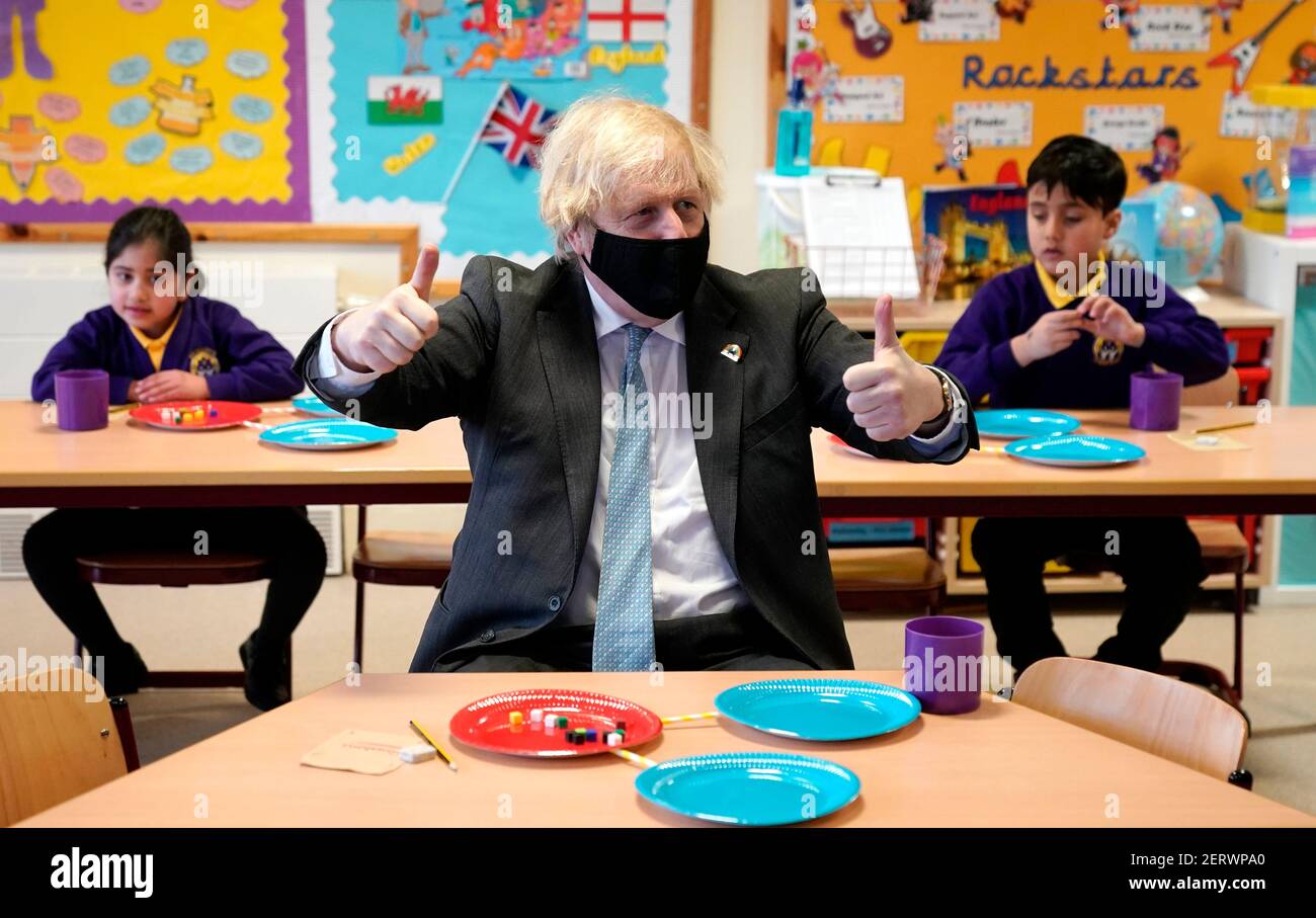Prime Minister Boris Johnson gives a thumbs up as he joins a Year 2 ...