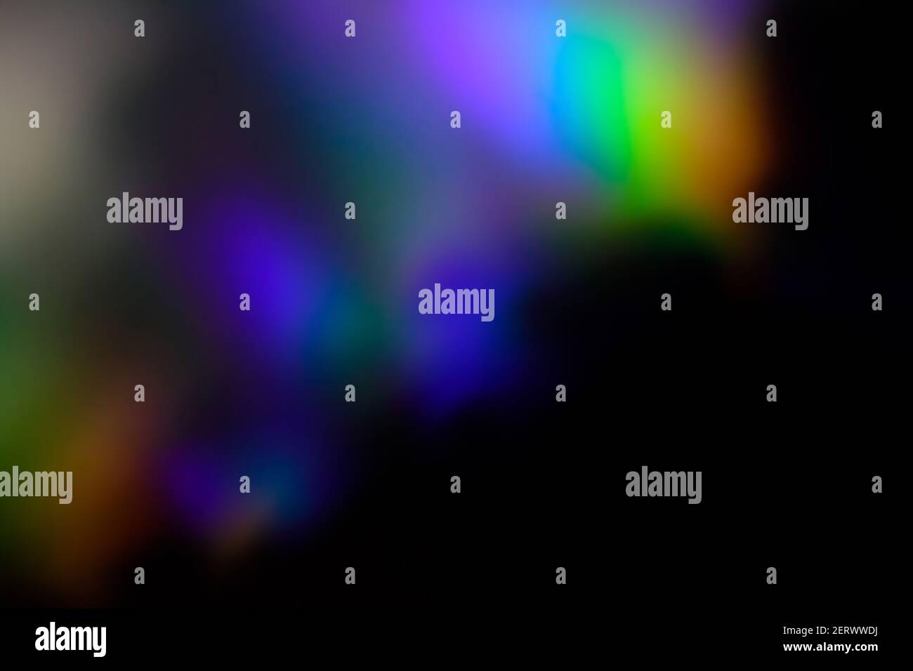 colorful warm rainbow light leaks on black background with dust texture Stock Photo - Alamy