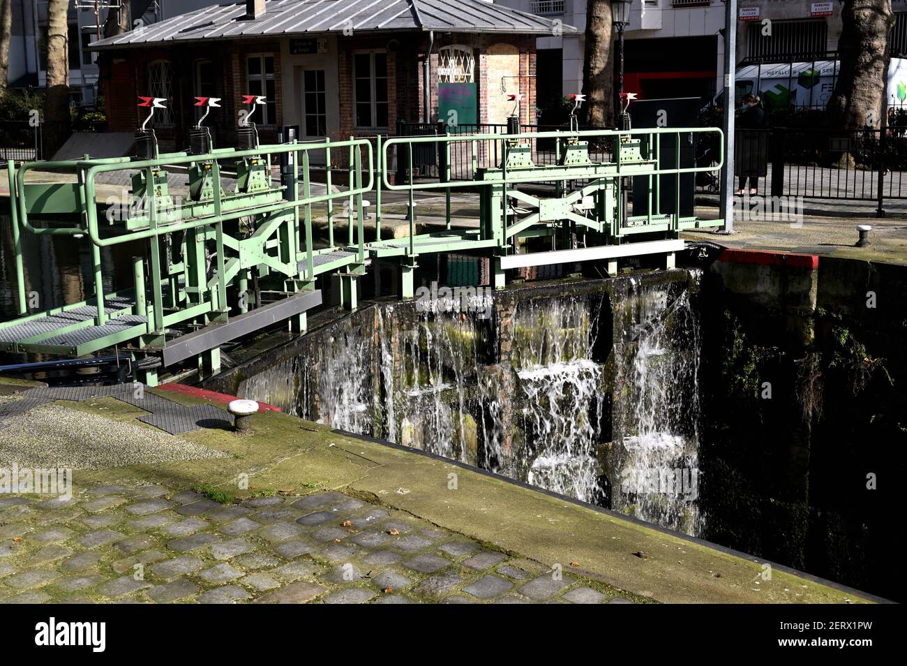 Canal Saint Martin bridge and locks Stock Photo - Alamy