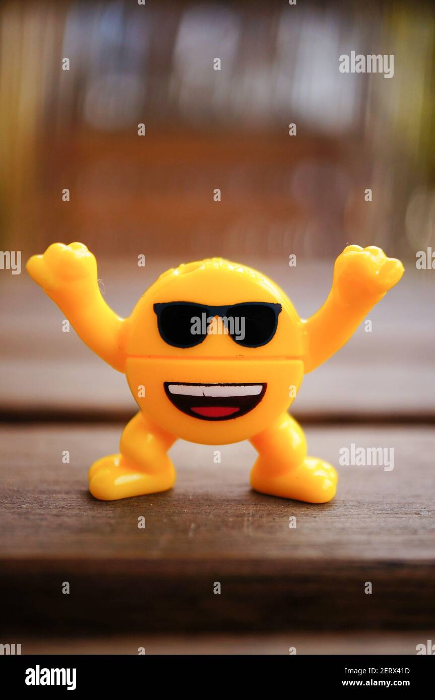 POZNAN, POLAND - Sep 02, 2018: Happy smiling yellow toy figurine ...