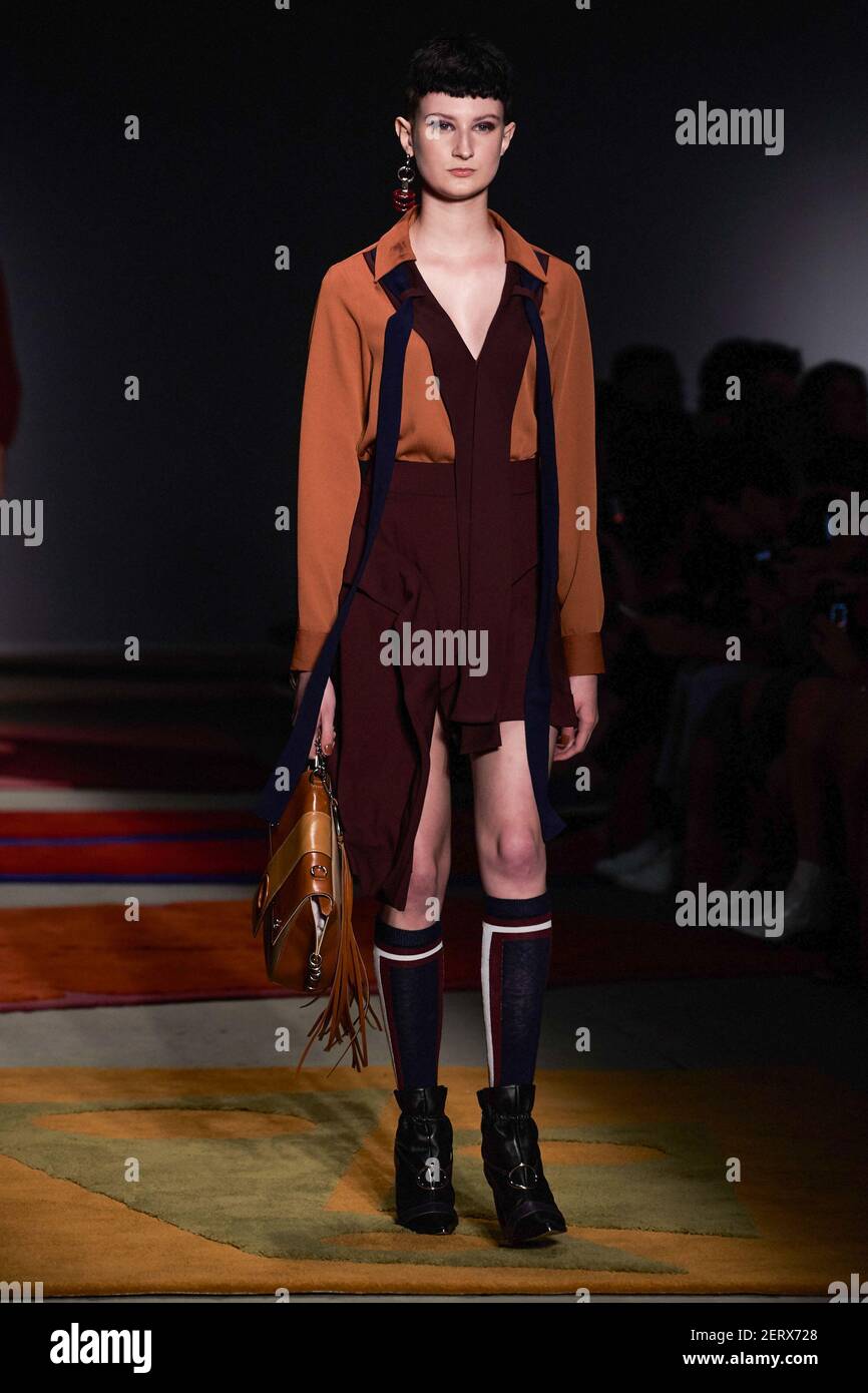 Model walks on the runway during the Modem brand fashion show held ...