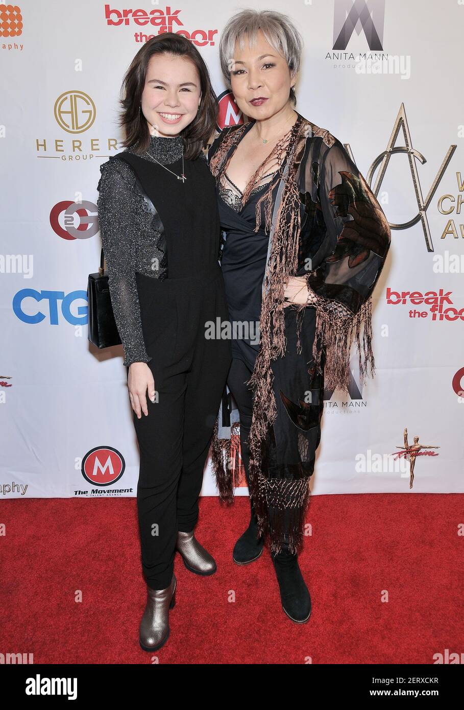 (R-L) Cindera Che and Guest at the 8th Annual World Choreography Awards ...